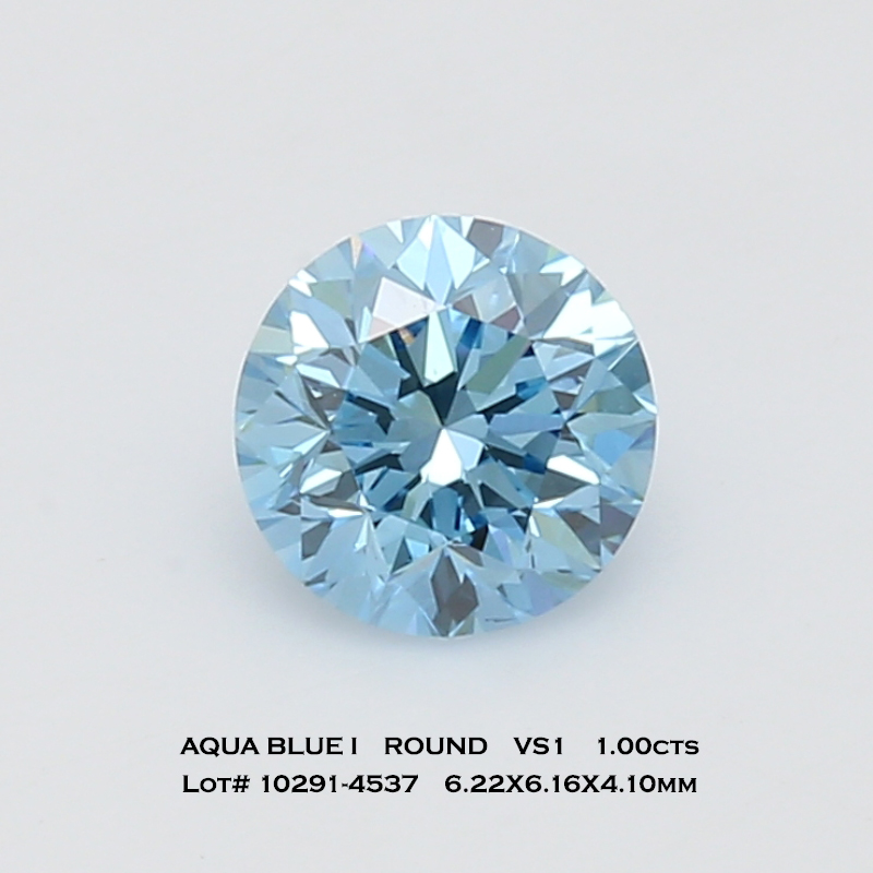 Color enhanced diamonds and jewelry